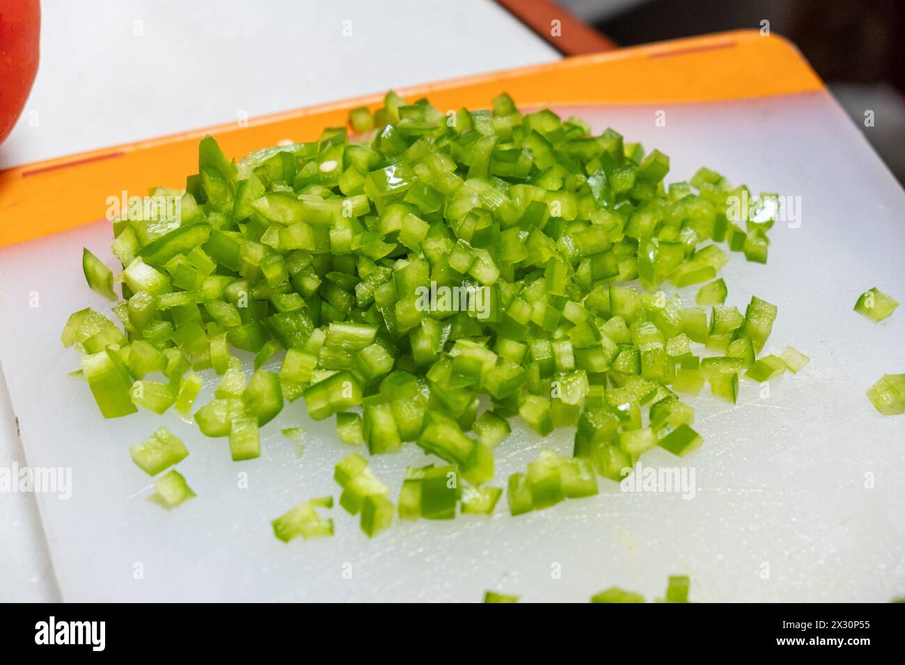 diced green bell pepper as an ingredient for a cooking recipe. Culinary ...