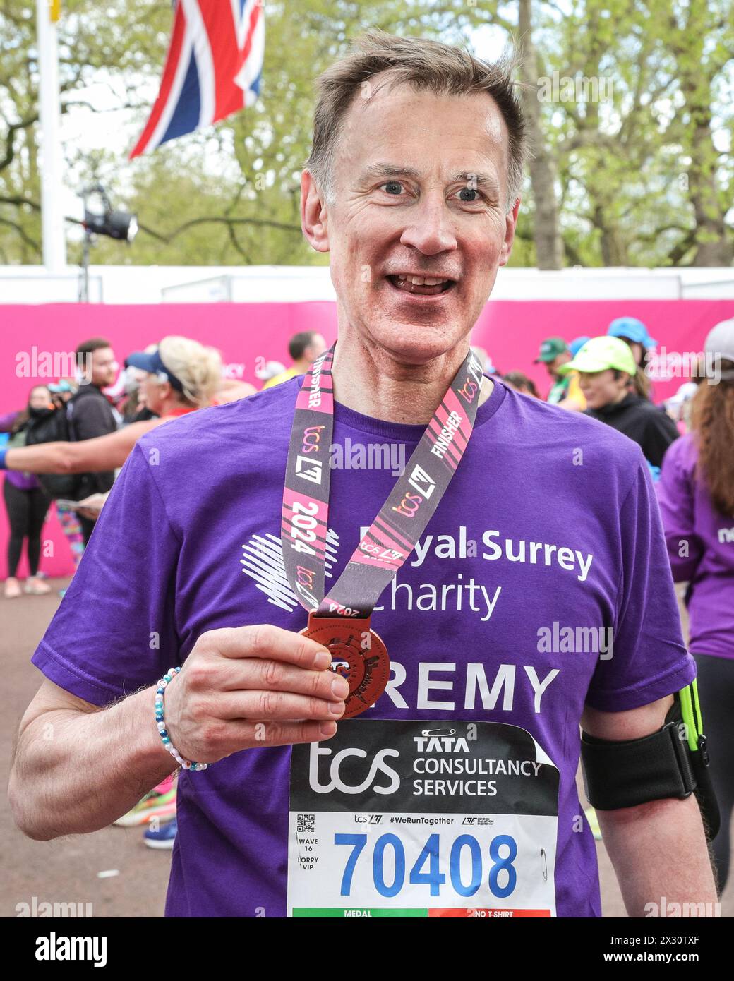 Jeremy Hunt, Chancellor of the Exchequer shows his medal and finishes ...