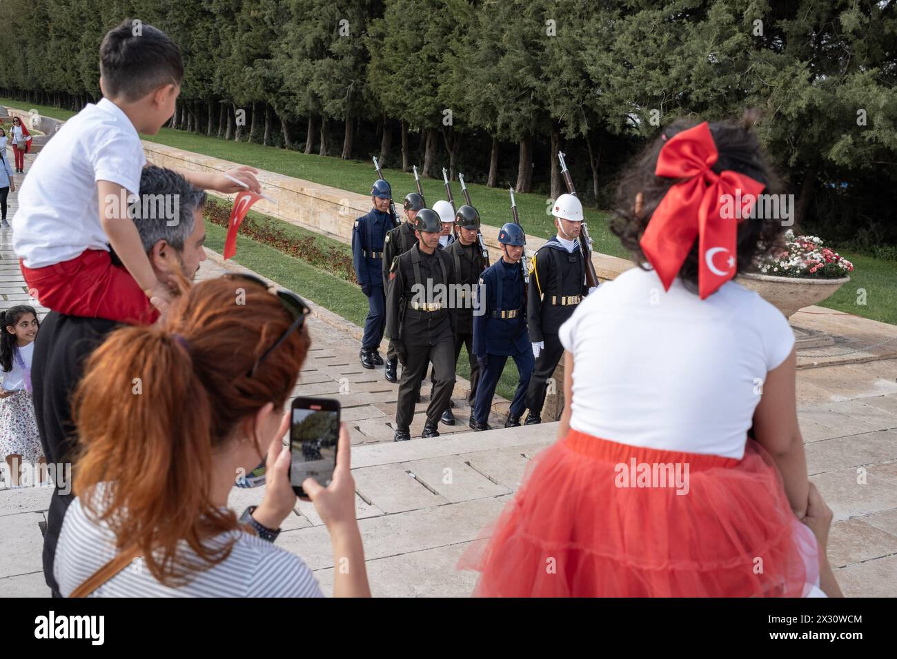Ankara, Turkey. 23rd Apr, 2024. Children mounted on their parents ...