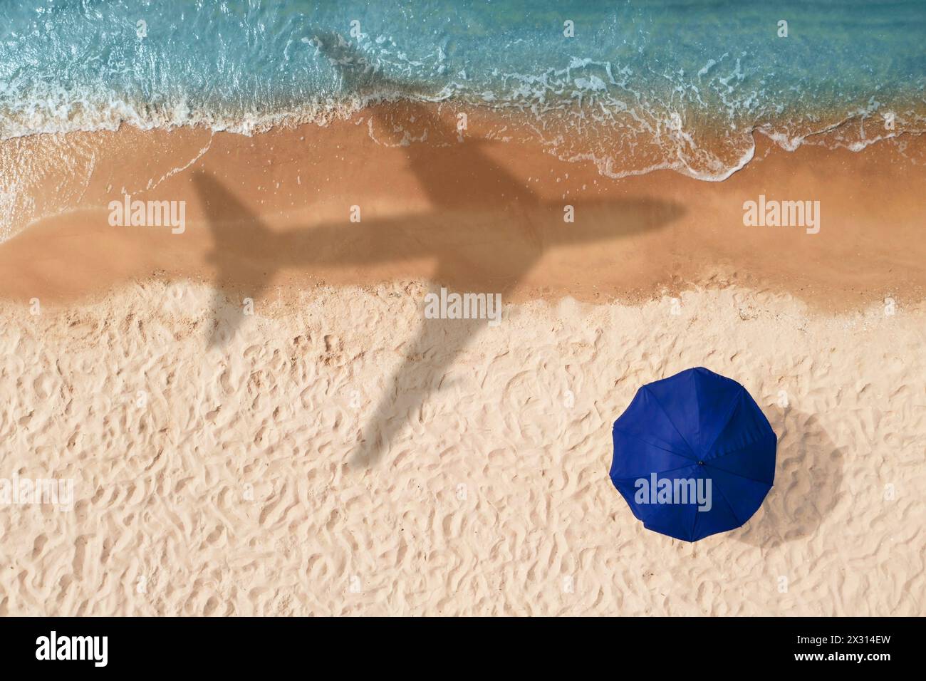 Shadow of airplane above sandy coast, aerial view. Summer vacation ...