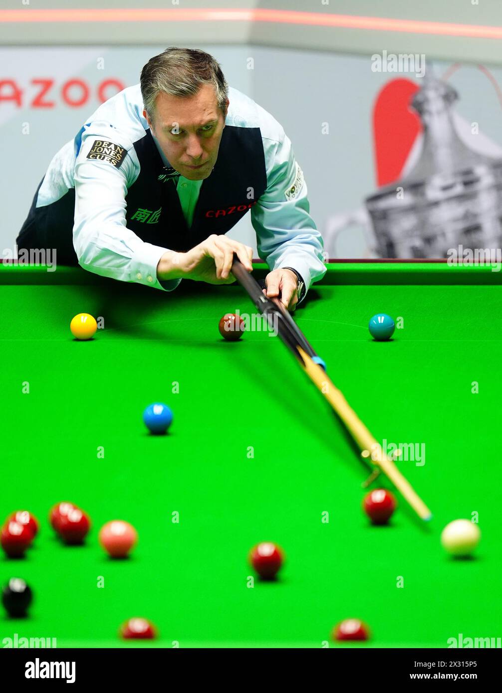Dominic Dale in action against Kyren Wilson (not pictured) on day five ...