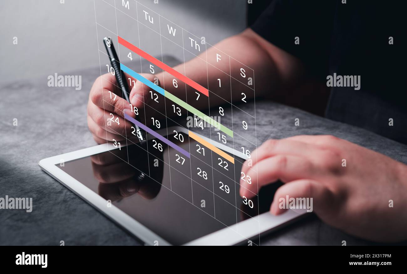 Woman use digital tablet to mark dates on virtual hologram calendar ...