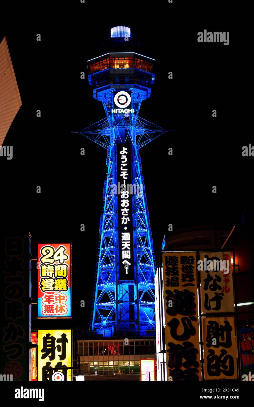 Night view with neon signs and illuminated billboards in Tsutenkaku ...
