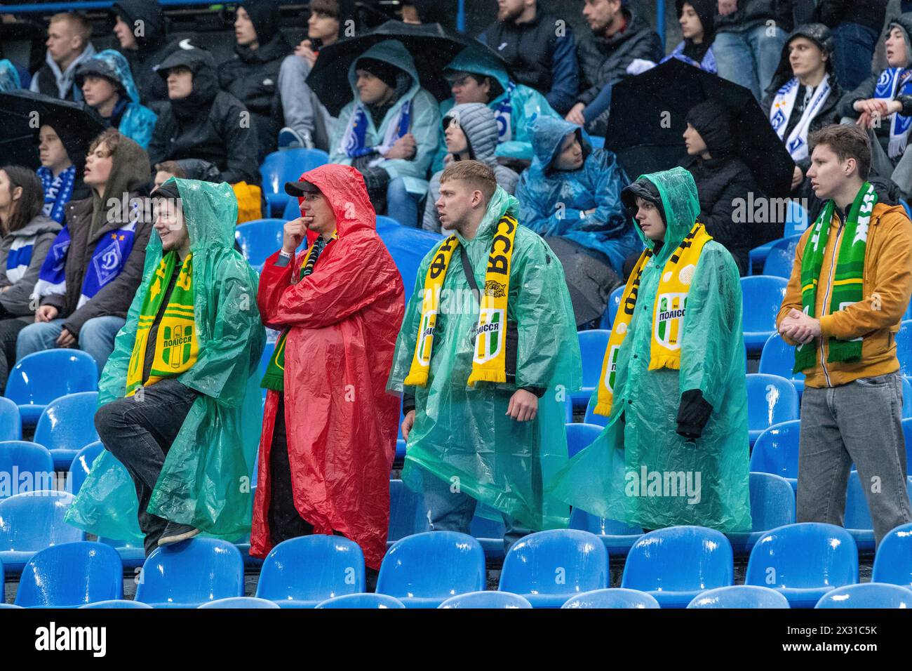 KYIV, UKRAINE - APRIL 21, 2024 - Fans brave the rain during the ...