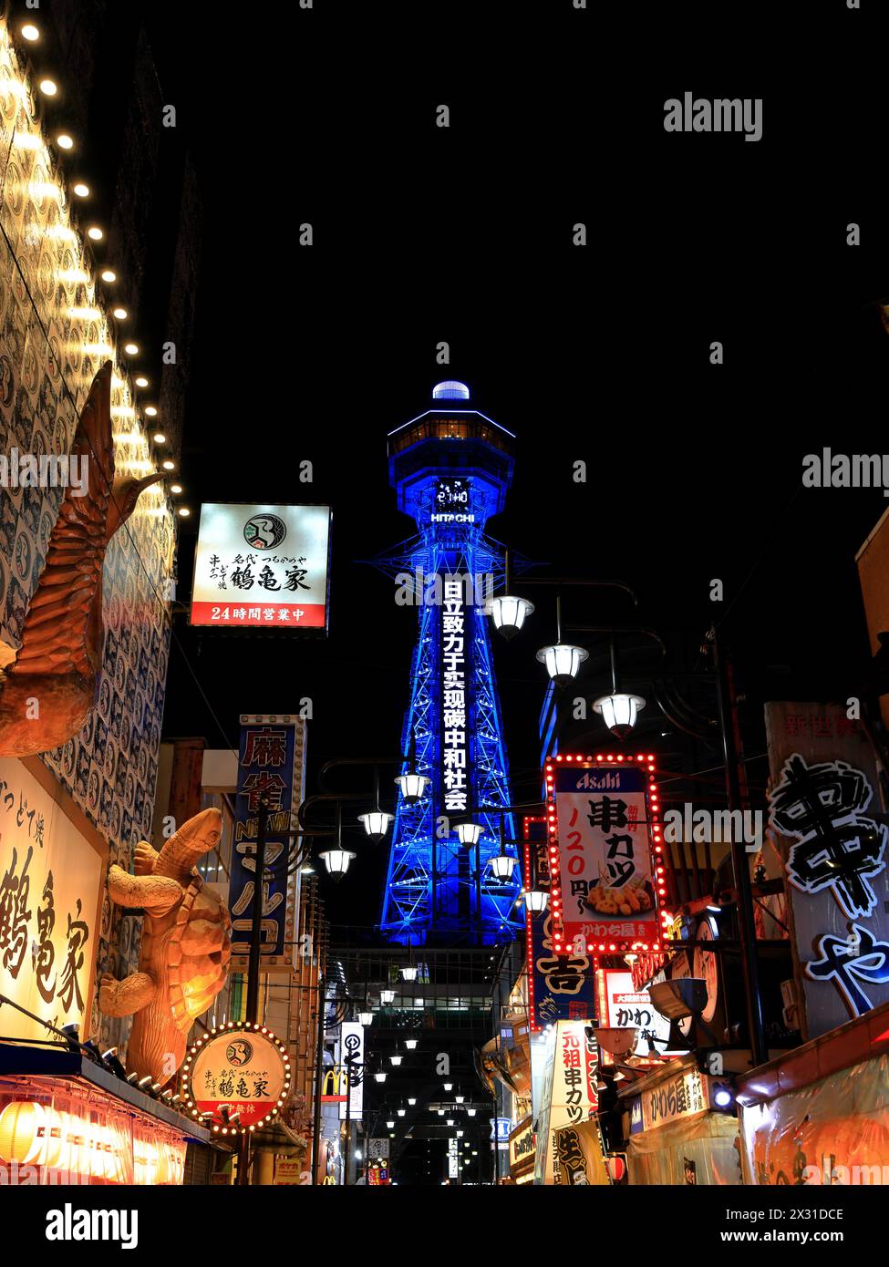 Night view with neon signs and illuminated billboards in Tsutenkaku ...