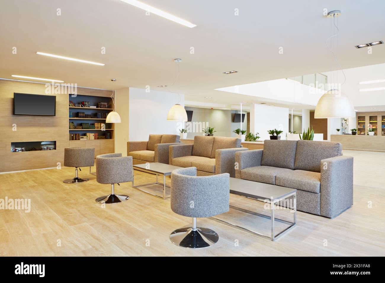 Rest zone and reception hall at business center Stock Photo - Alamy
