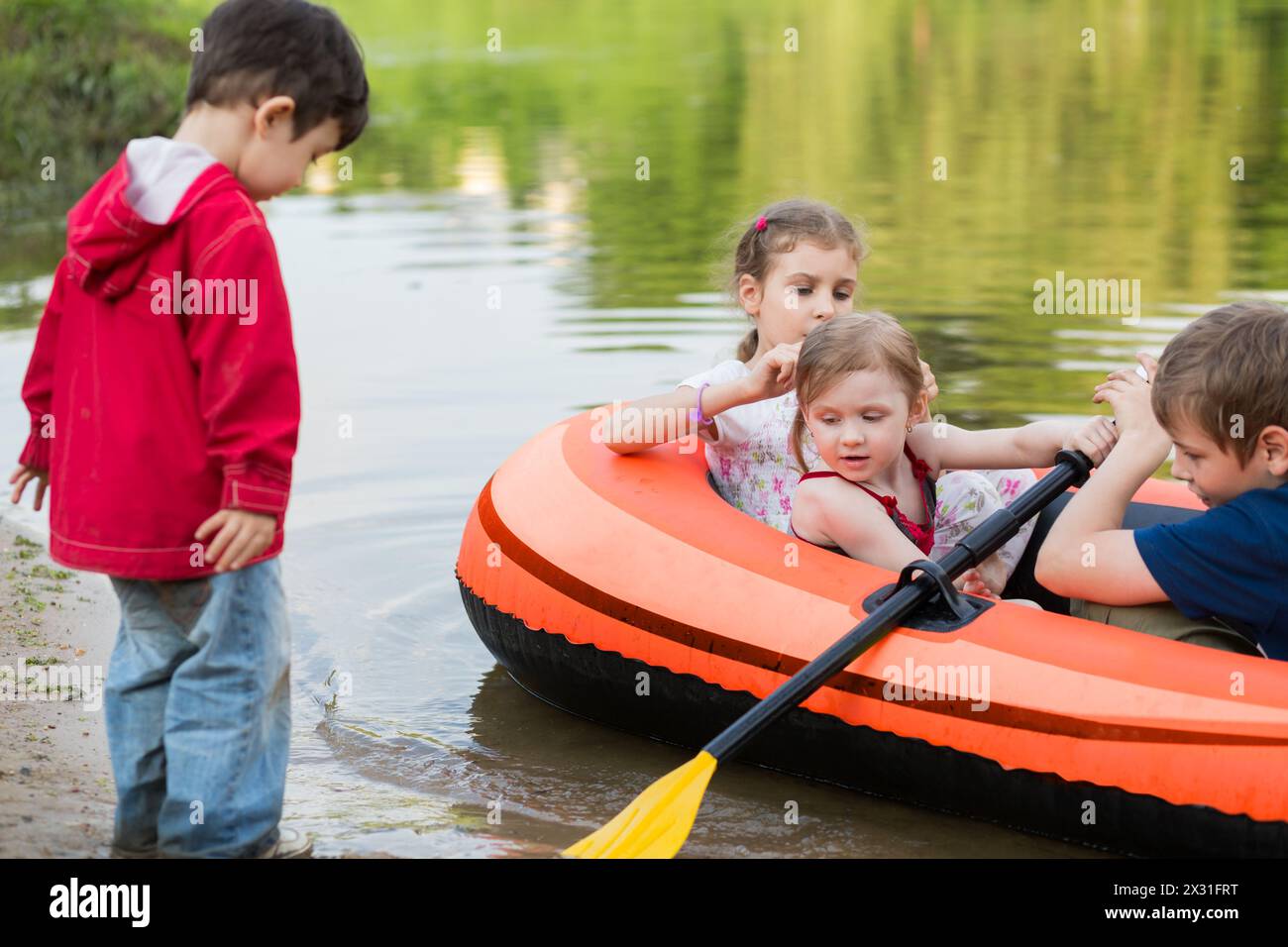Girl on inflatable boat hi-res stock photography and images - Alamy