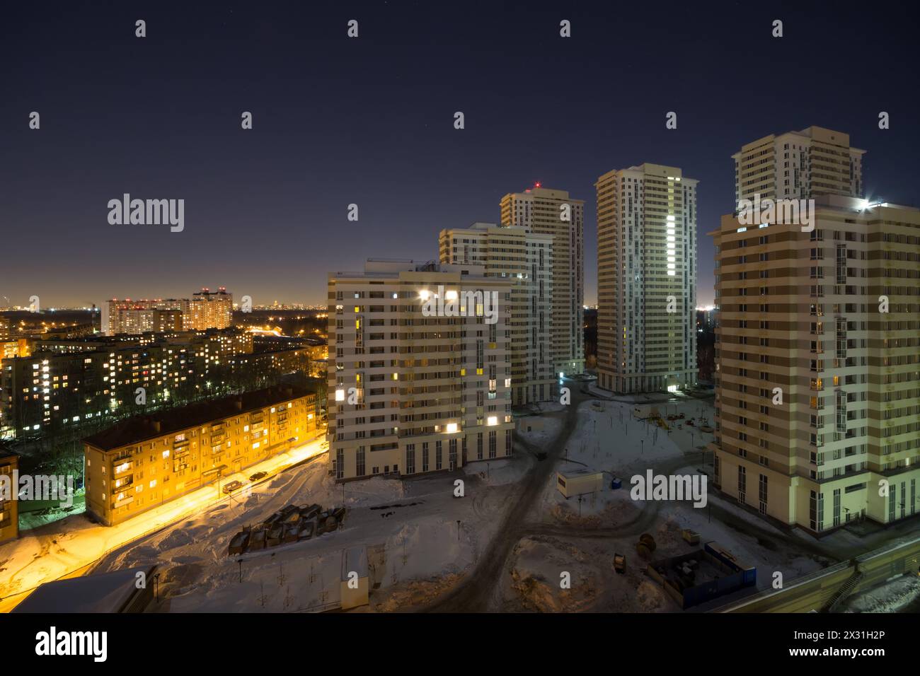 Beautiful evening landscape with urban housing complex in the final ...