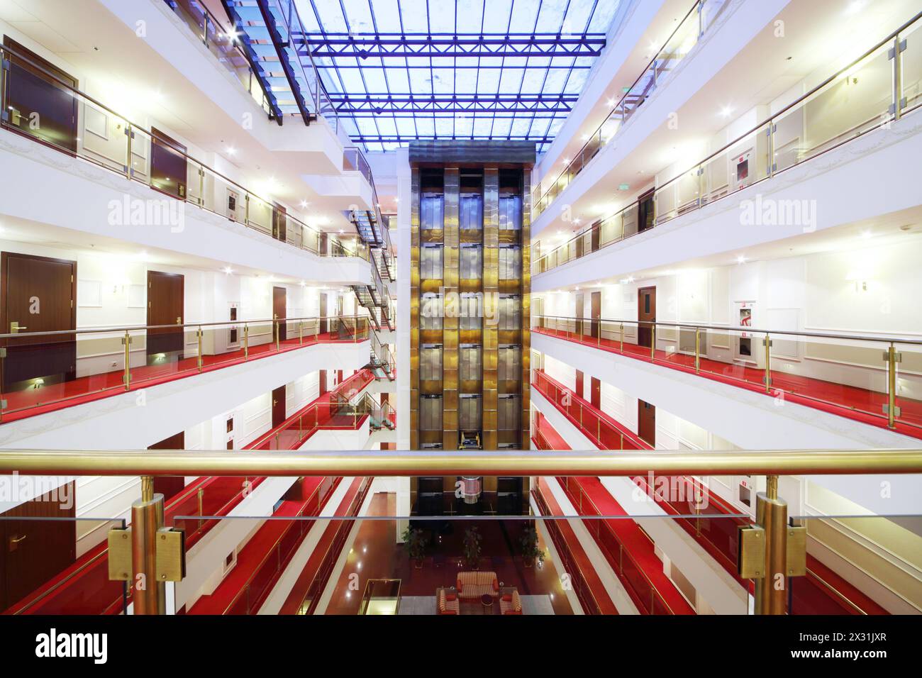 Elevators and floors in light and spacious hotel with glass roof Stock ...