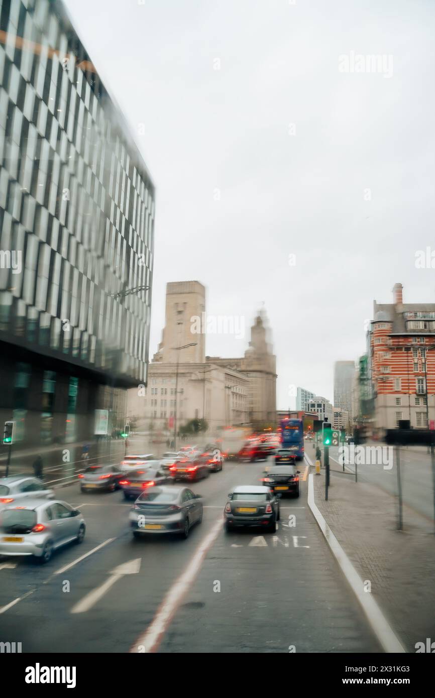 Smudged view of road traffic in Liverpool on a rainy day through the ...