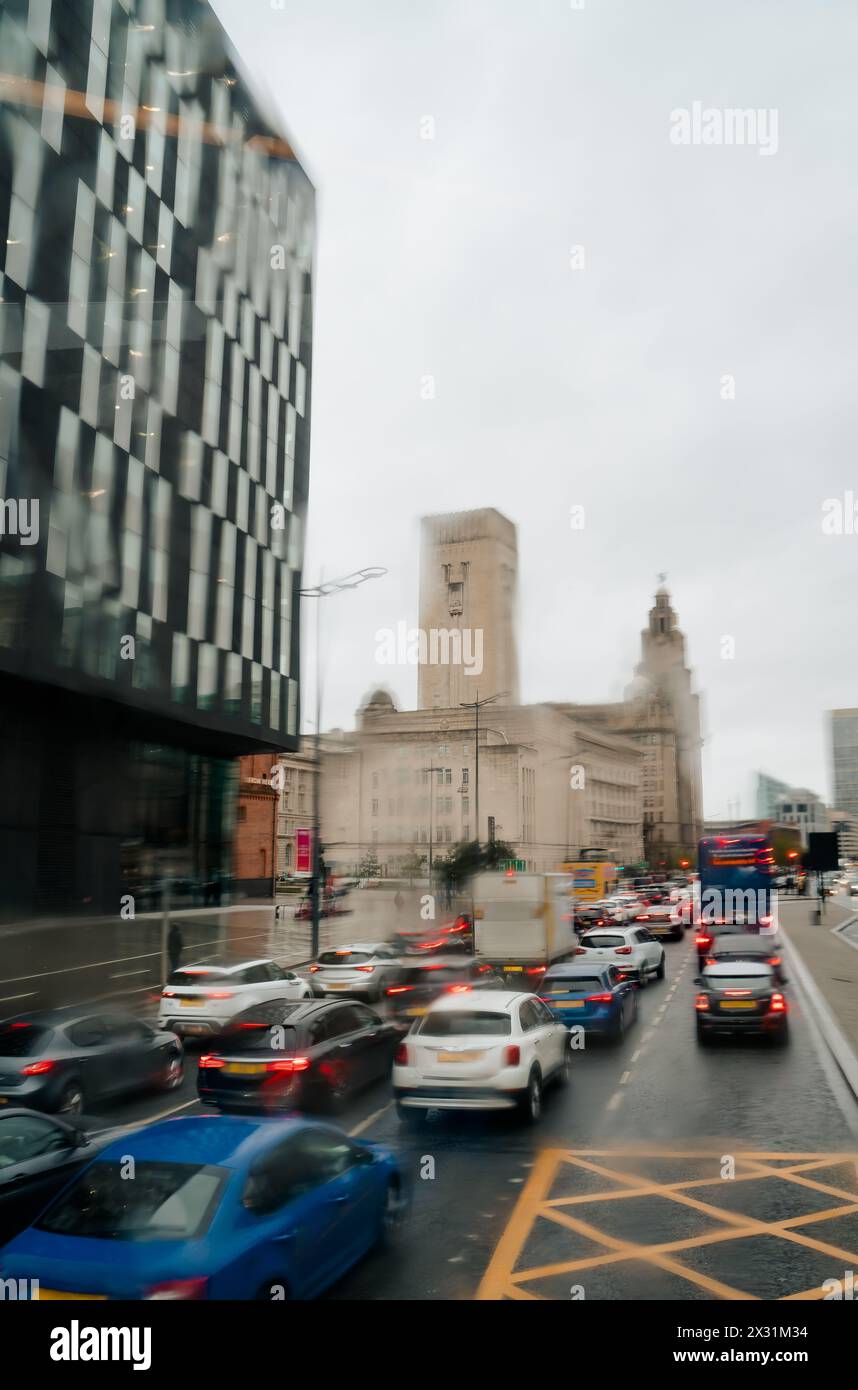 Blurred view of road traffic in Liverpool on a rainy day through the ...