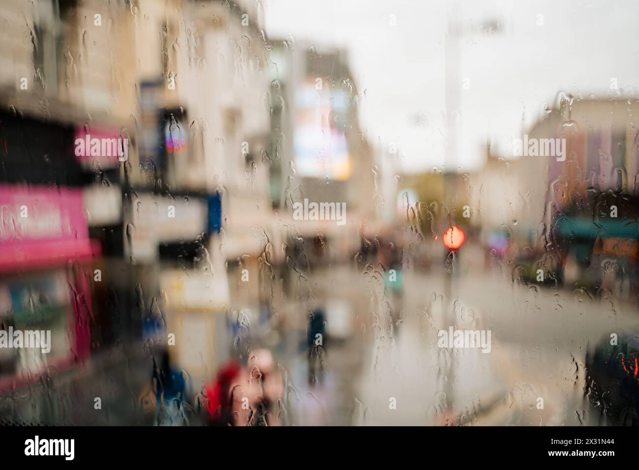 Rainy day in Liverpool, seen through the rain-splattered window of a ...