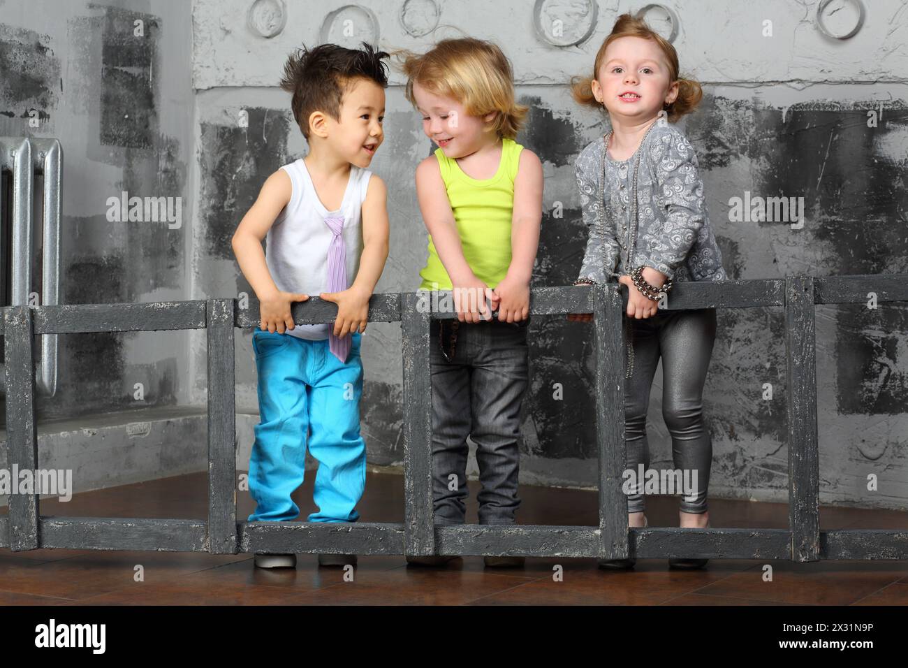Children together carry wooden stairs Stock Photo - Alamy
