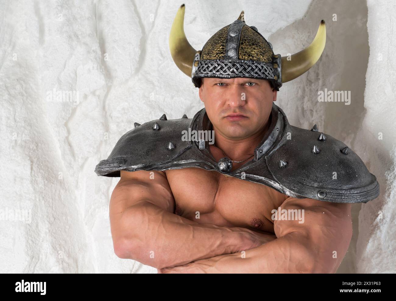 A muscular man in costume viking with armor Stock Photo - Alamy