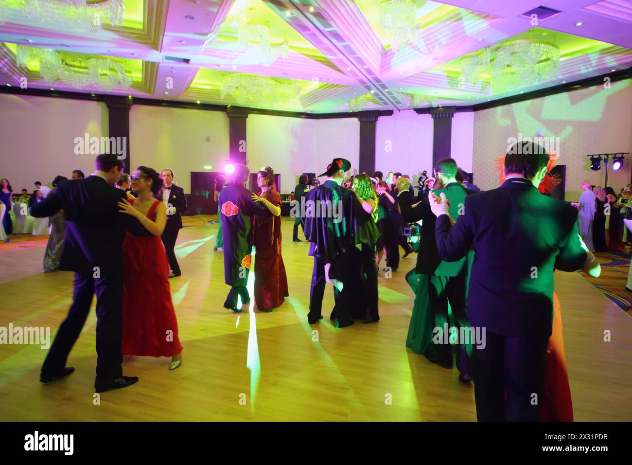 MOSCOW - DEC 23: People dance in pairs in costumes and masks at ...