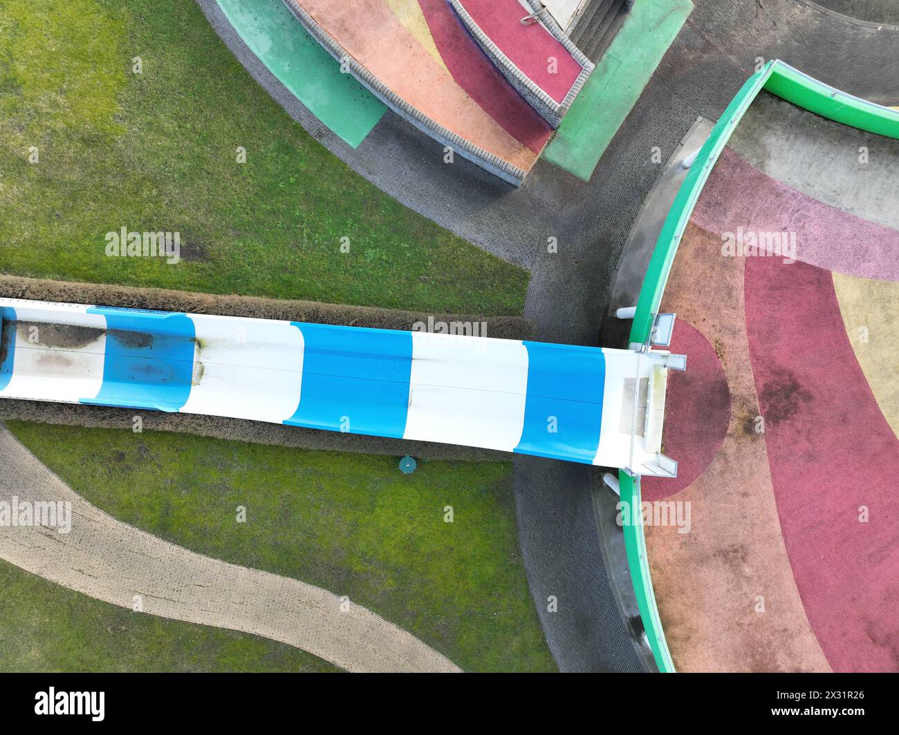 Aerial drone view children playground in the form of a puzzle piece ...