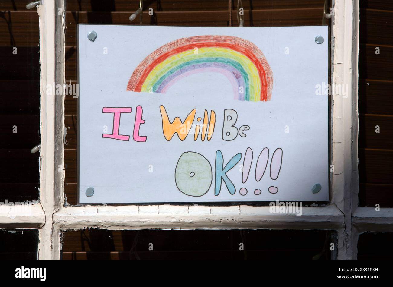 Children’s rainbow message signs saying “It will be ok” in ‘Krusties ...