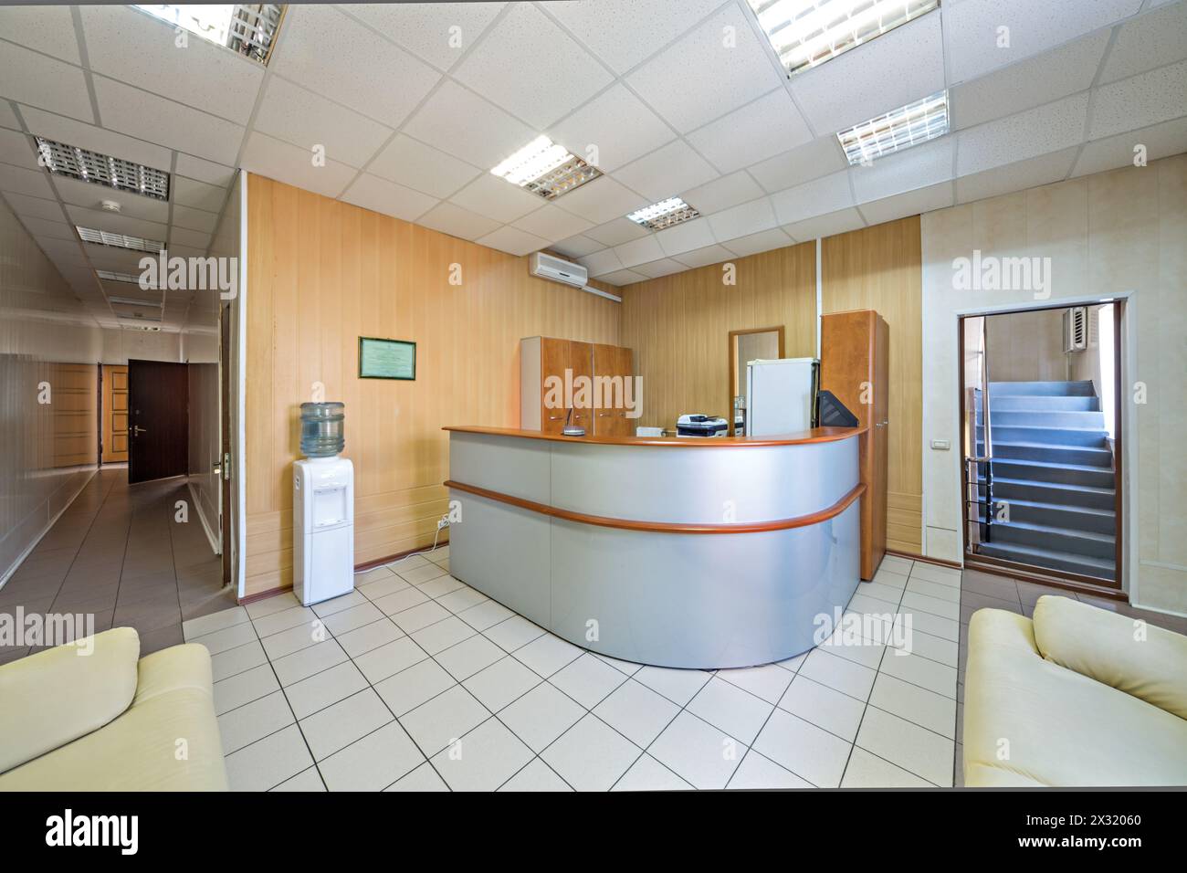 The front desk in a modern office building Stock Photo - Alamy