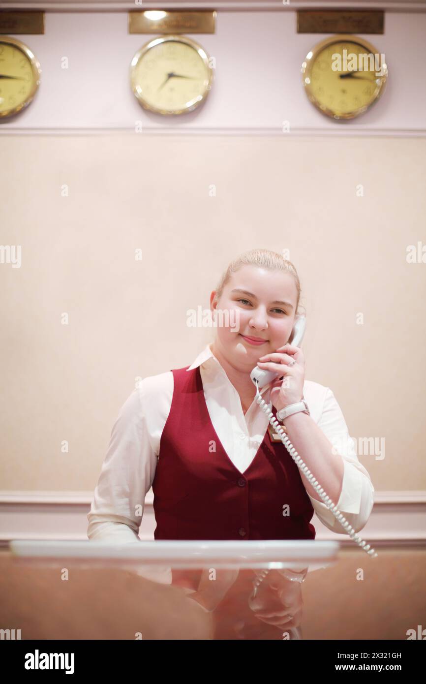 Hotel reception desk clock hi-res stock photography and images - Alamy