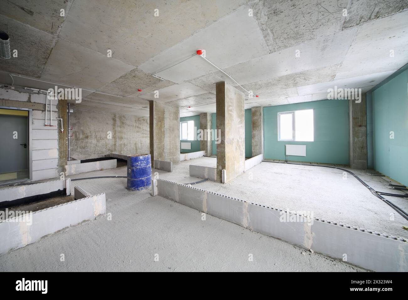 Unit in building under construction without finishing and with markings ...