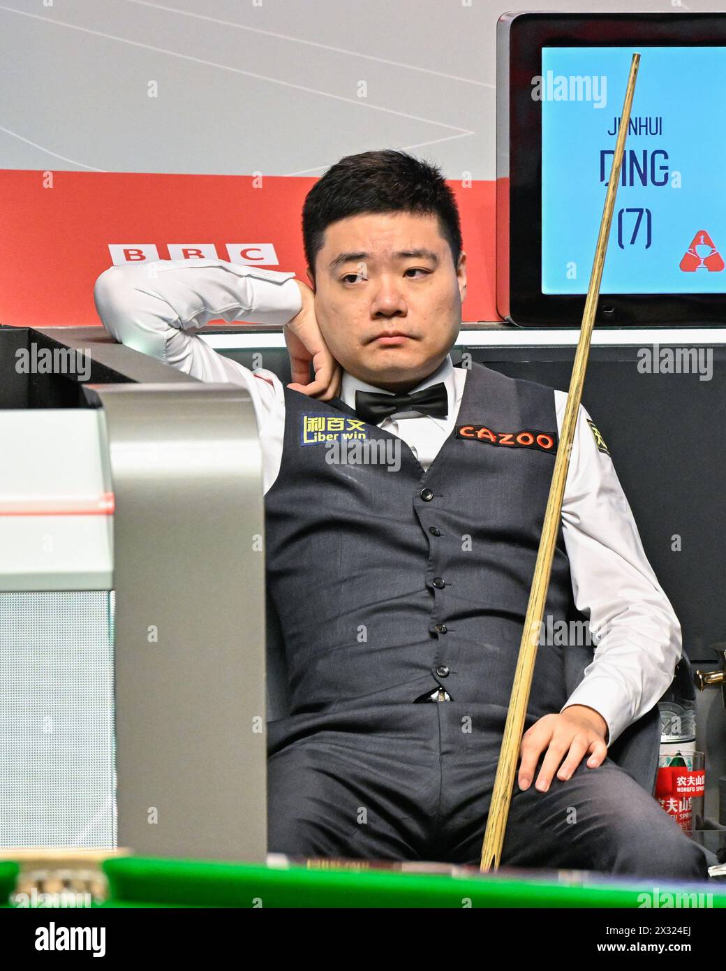 Ding Junhui watches on, during the Cazoo World Championships 2024 at ...