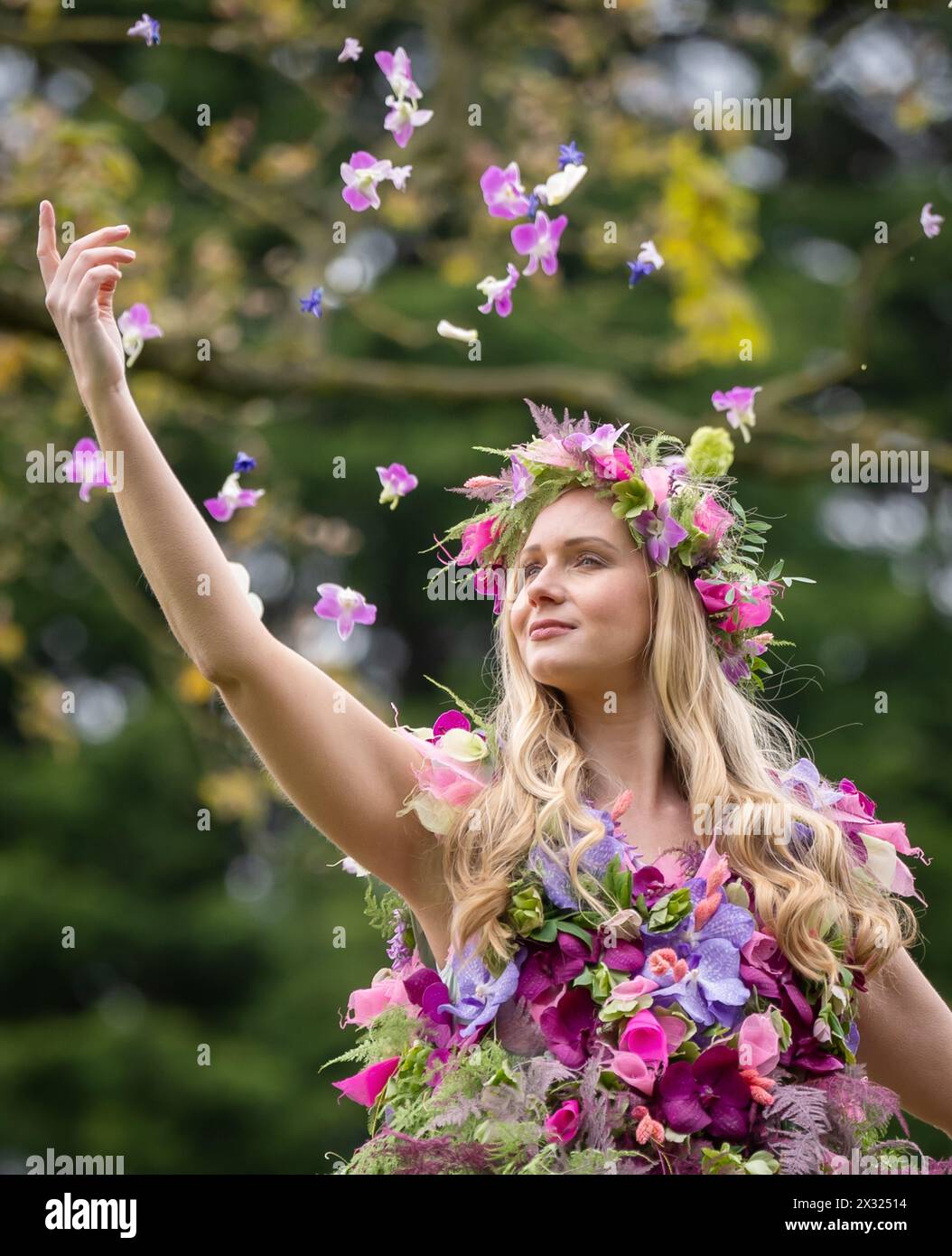 Lucy Kent models a floral gown and headdress created by award-winning ...