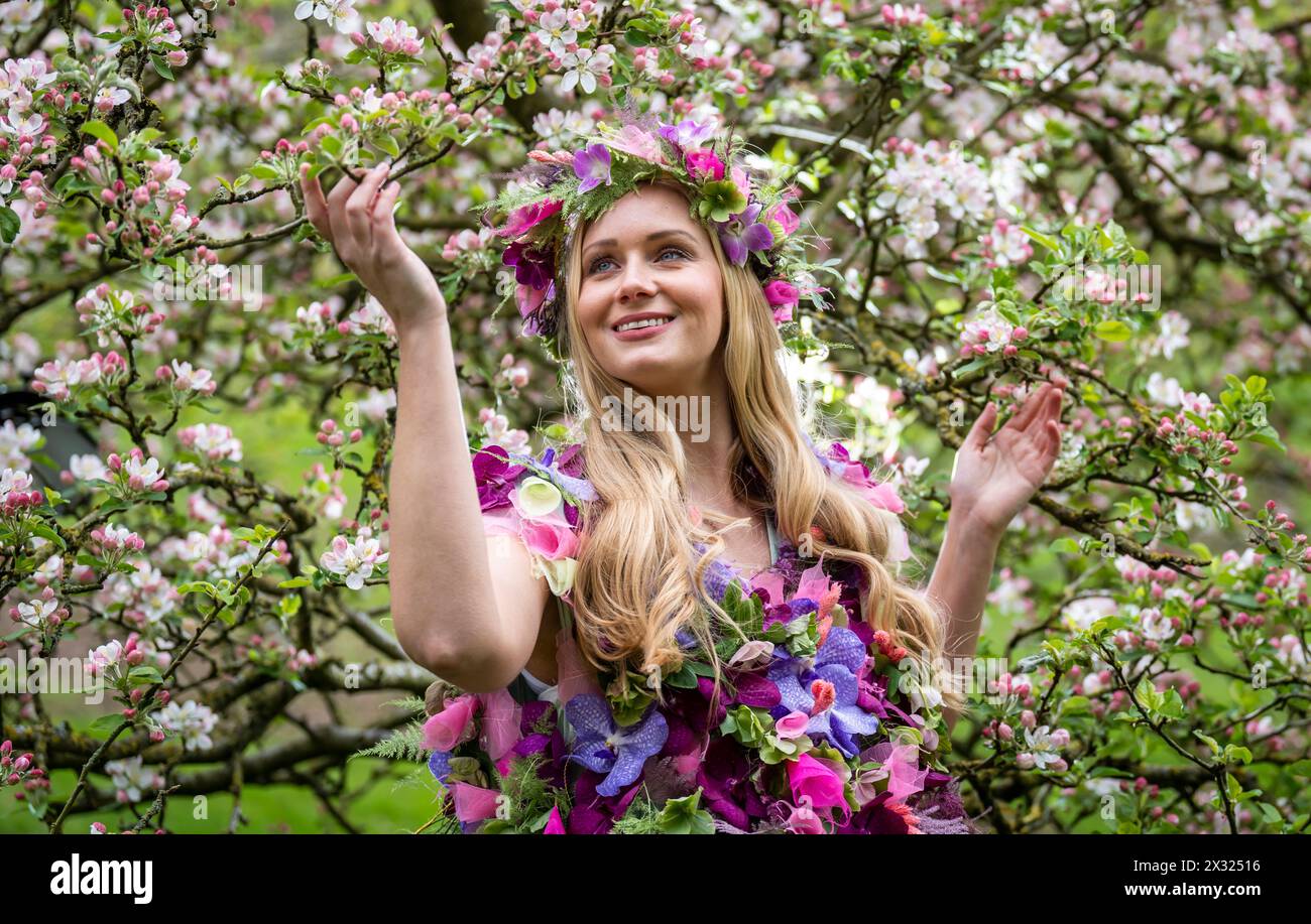 Lucy Kent models a floral gown and headdress created by award-winning ...