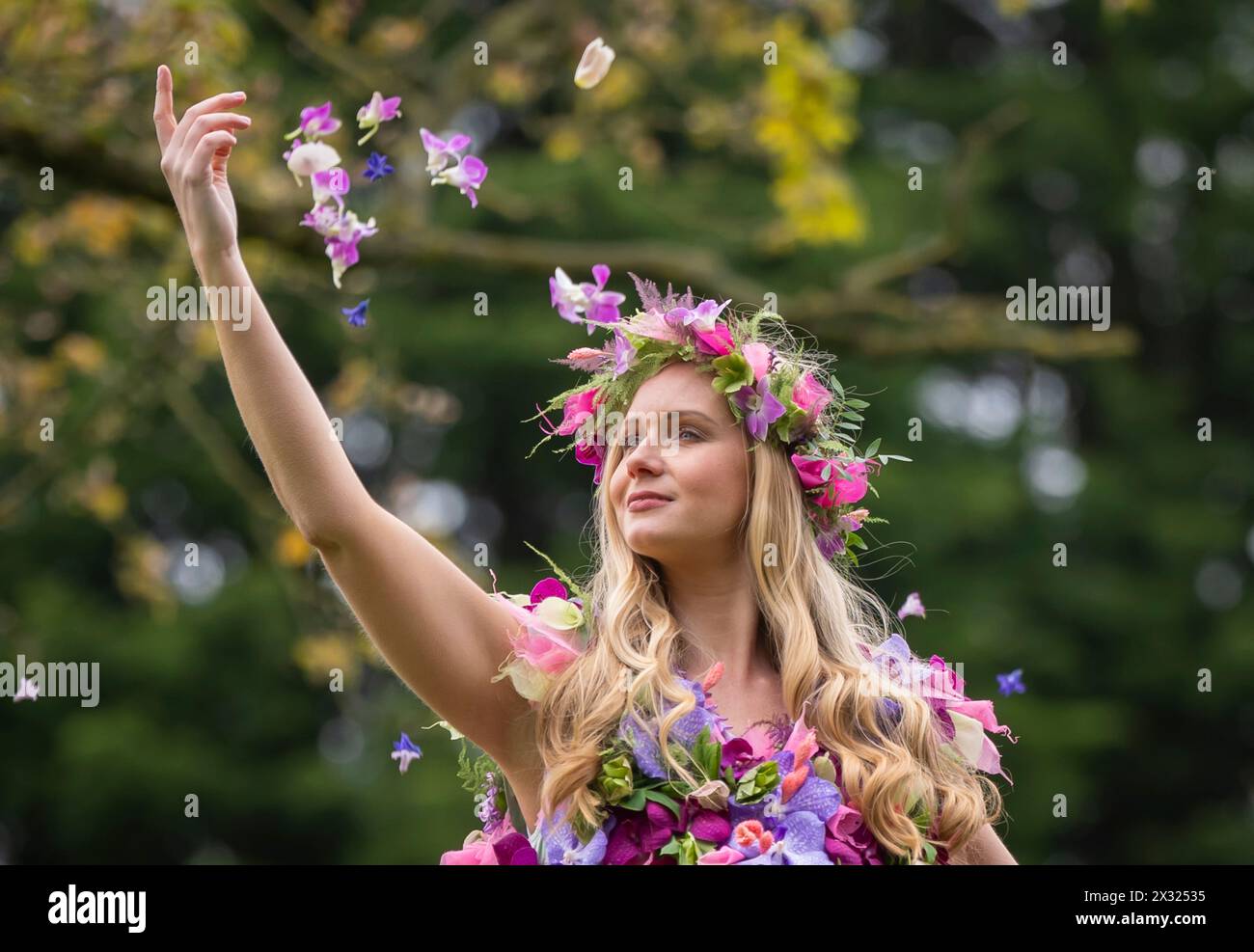 Lucy Kent models a floral gown and headdress created by award-winning ...