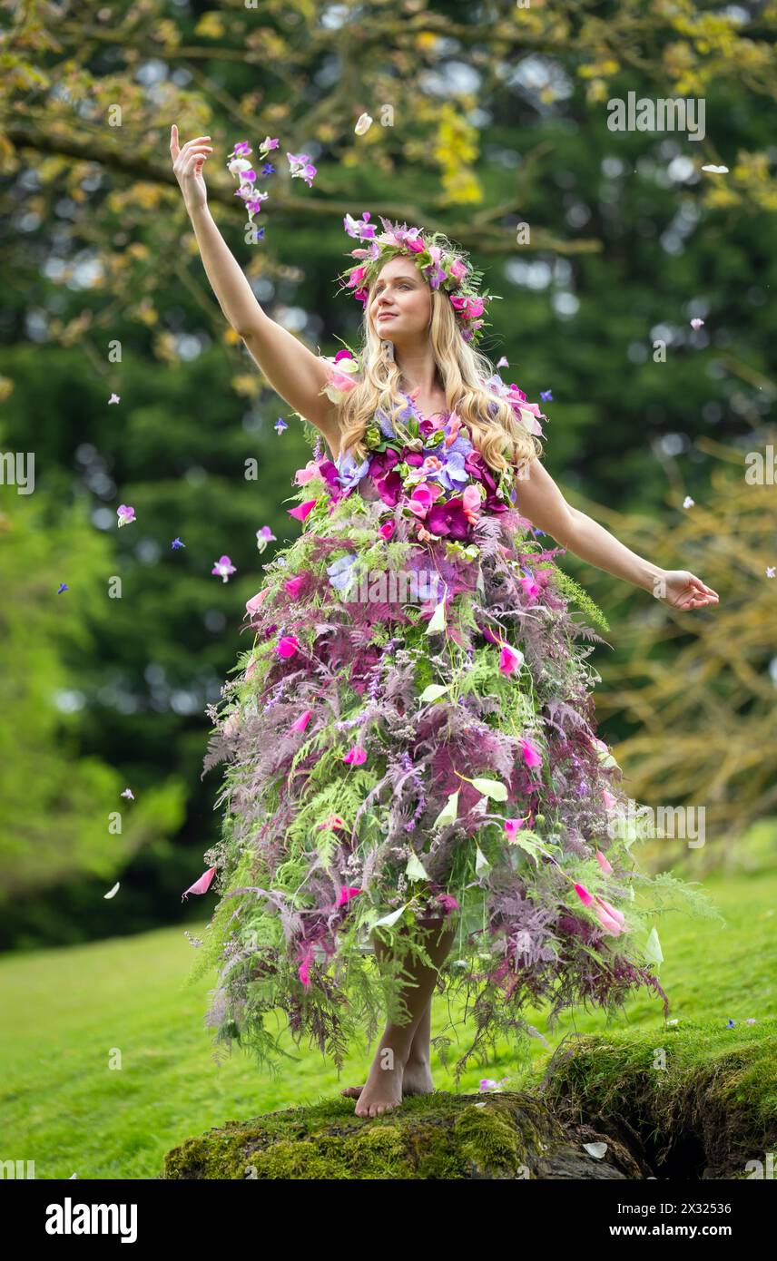 Lucy Kent models a floral gown and headdress created by award-winning ...