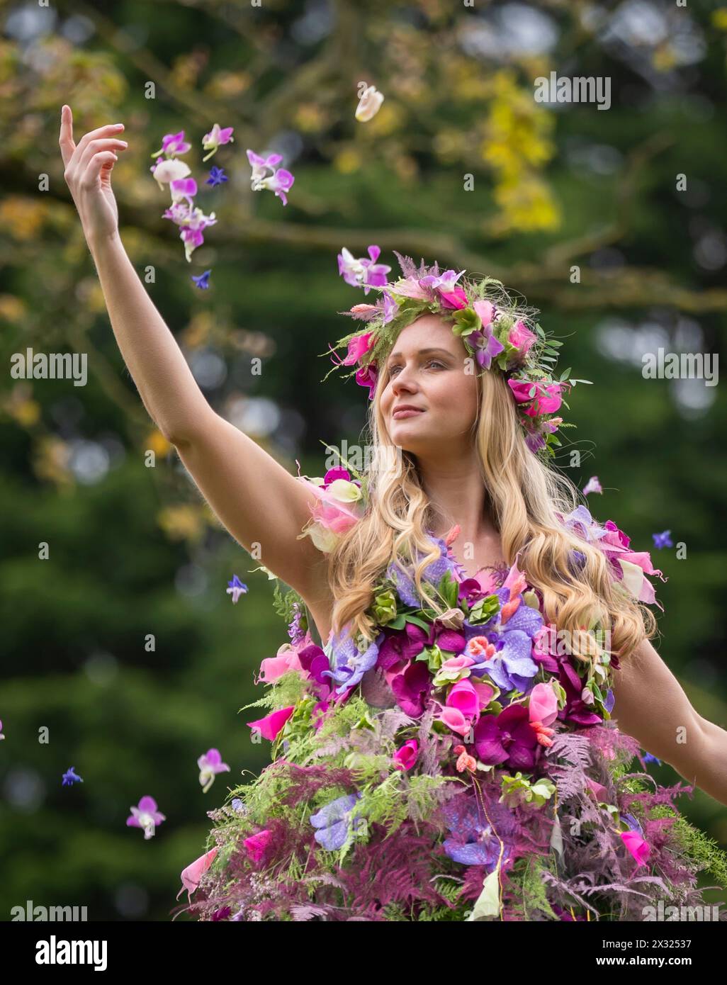 Lucy Kent models a floral gown and headdress created by award-winning ...