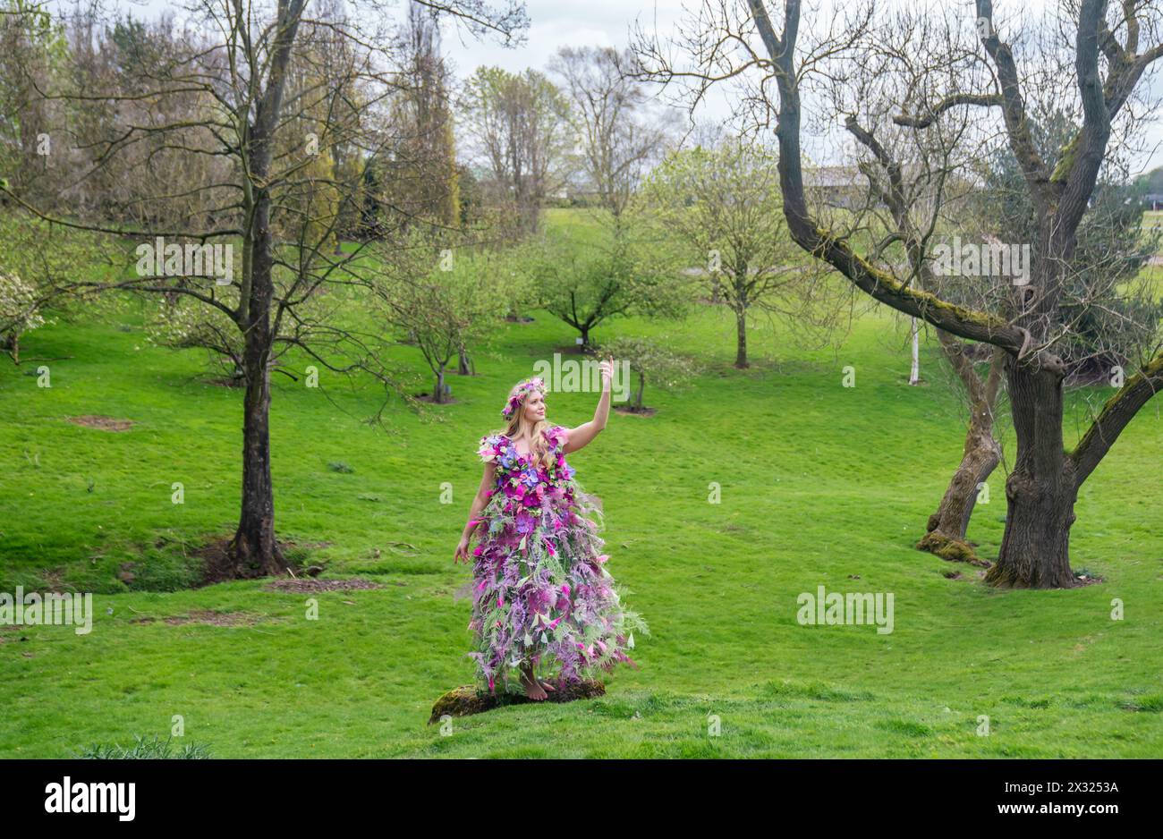 Lucy Kent models a floral gown and headdress created by award-winning ...