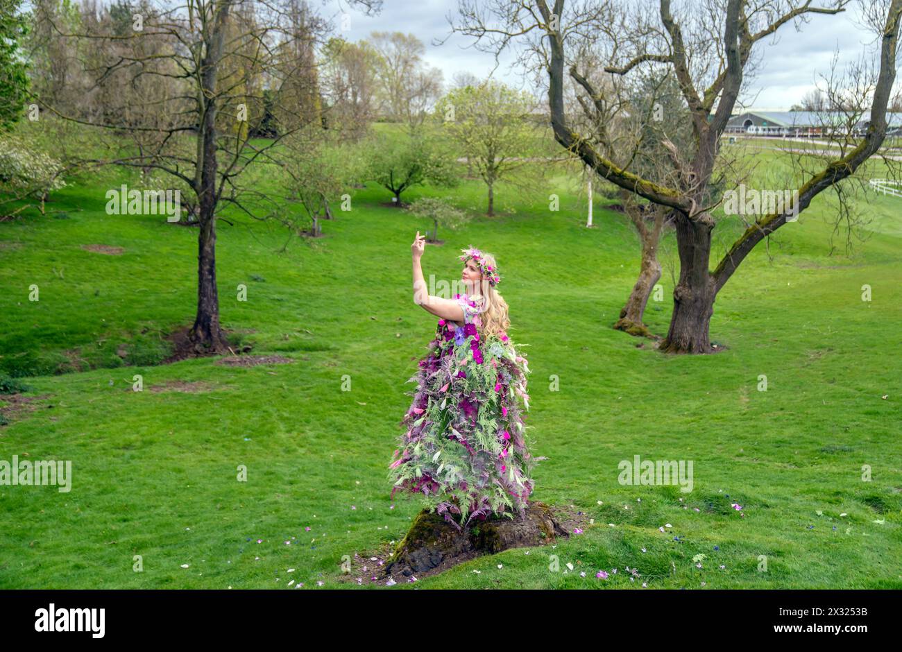Lucy Kent models a floral gown and headdress created by award-winning ...