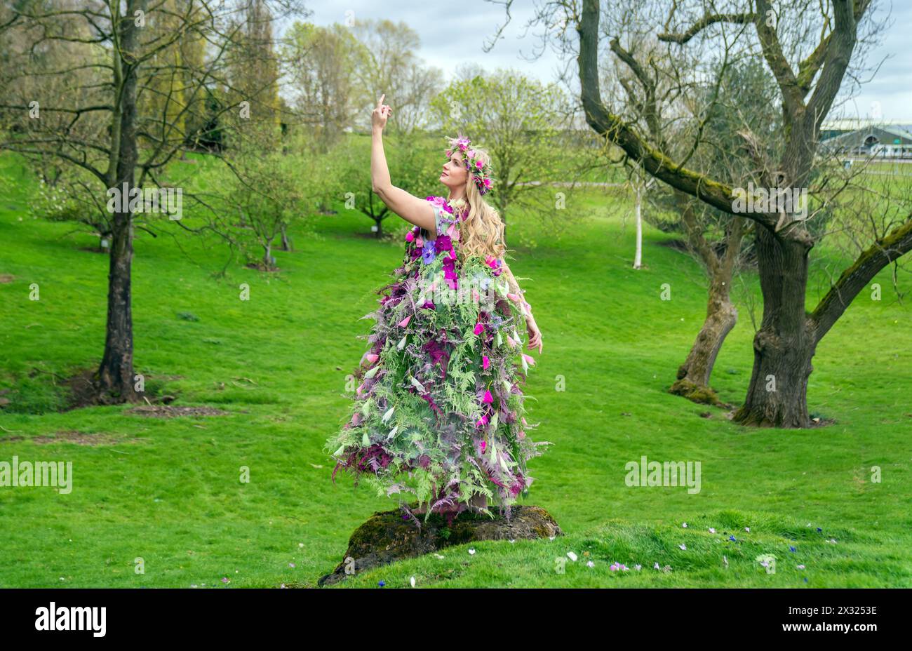 Lucy Kent models a floral gown and headdress created by award-winning ...