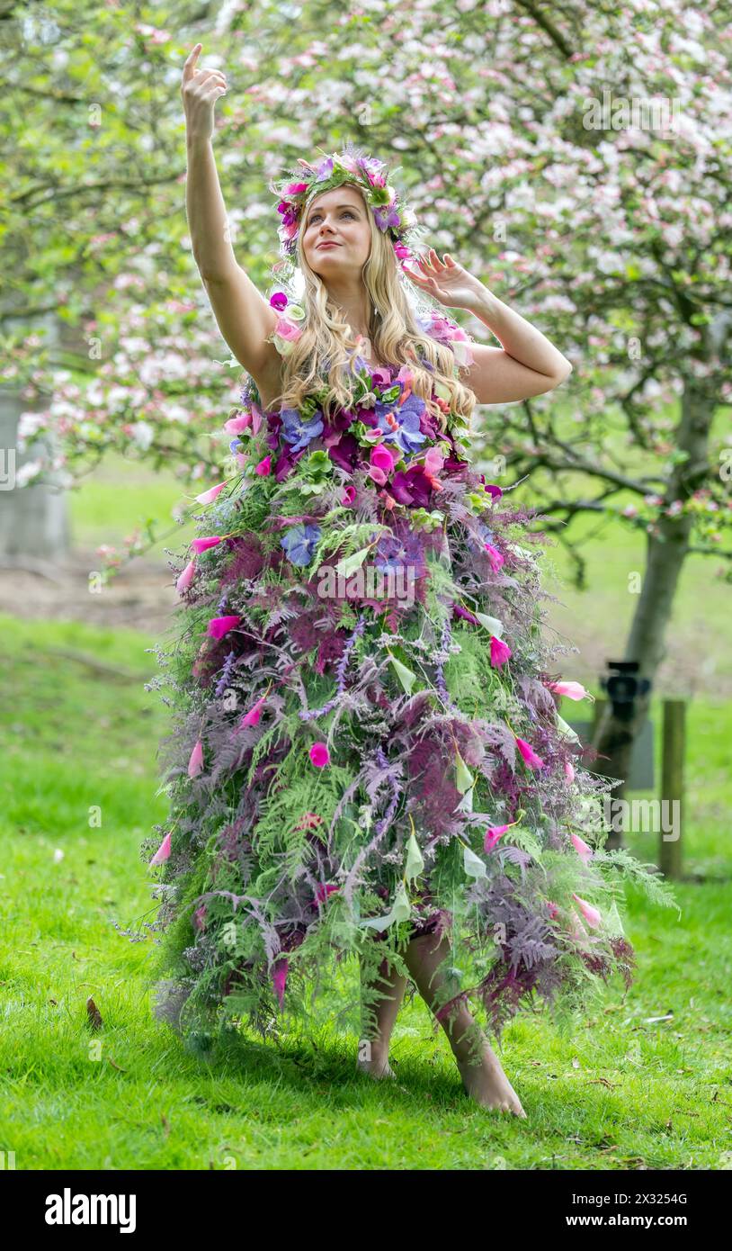 Lucy Kent models a floral gown and headdress created by award-winning ...