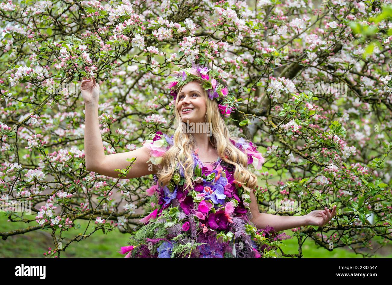 Lucy Kent models a floral gown and headdress created by award-winning ...