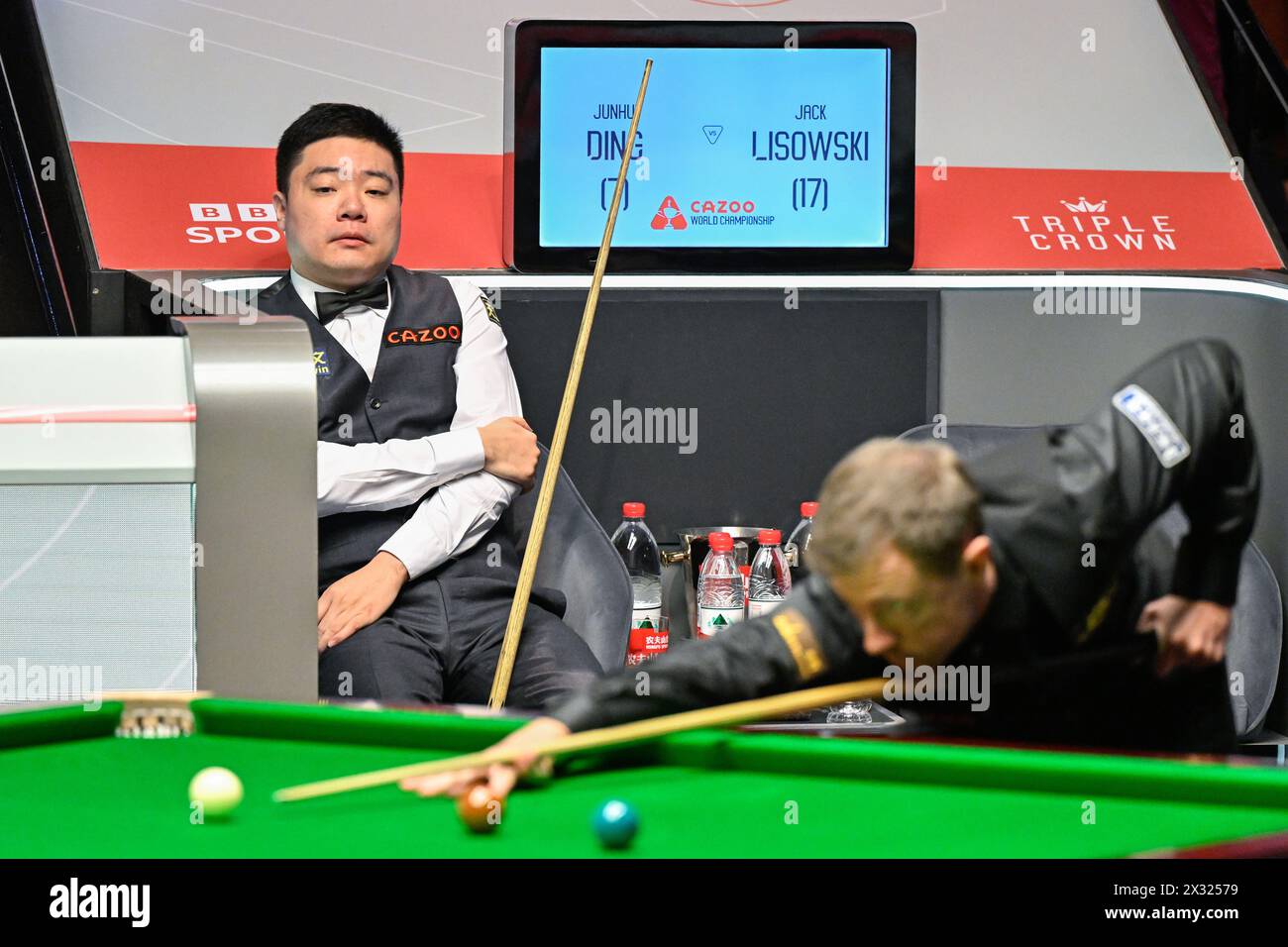 Ding Junhui watches on, during the Cazoo World Championships 2024 at ...