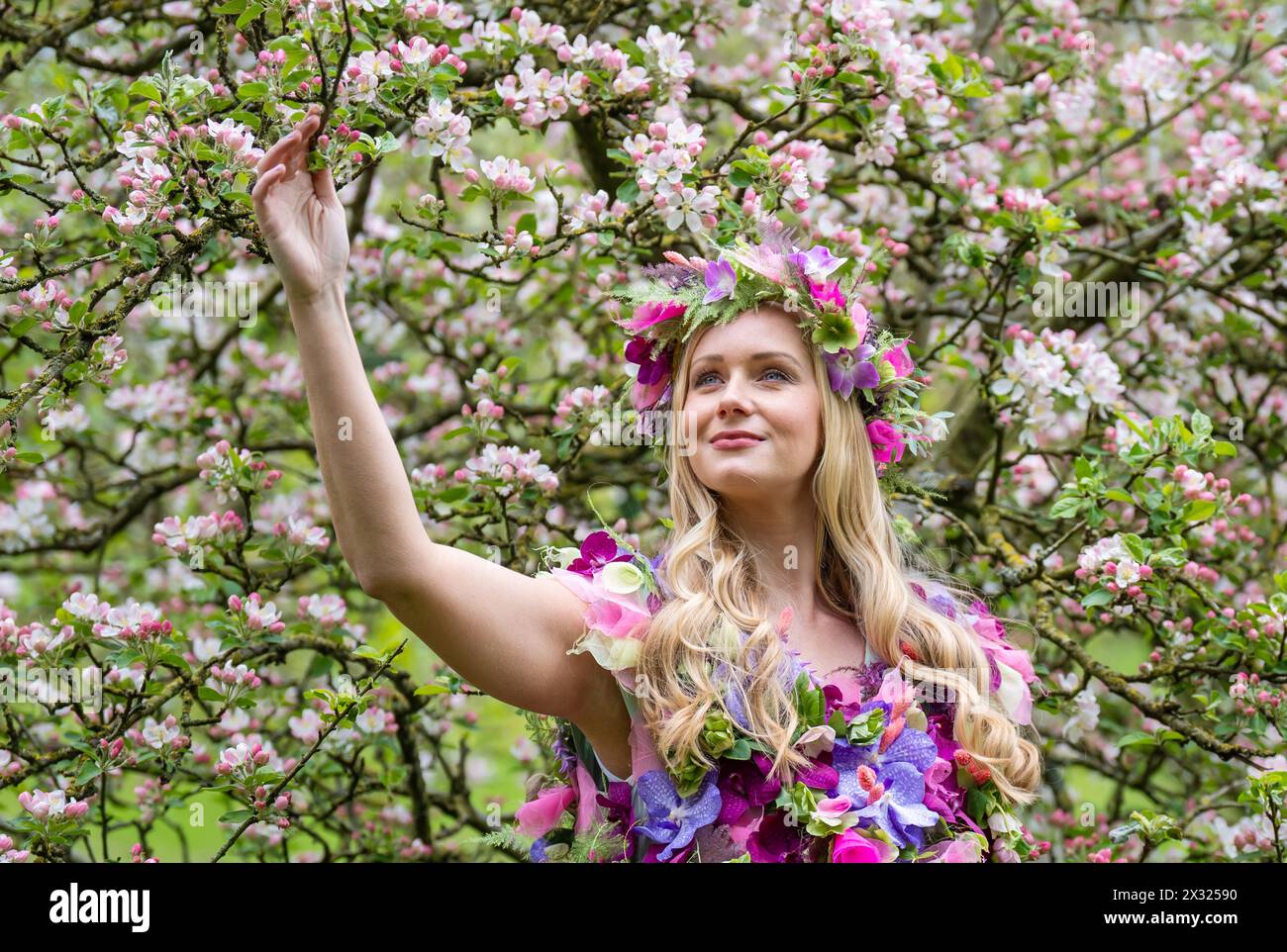 Lucy Kent models a floral gown and headdress created by award-winning ...
