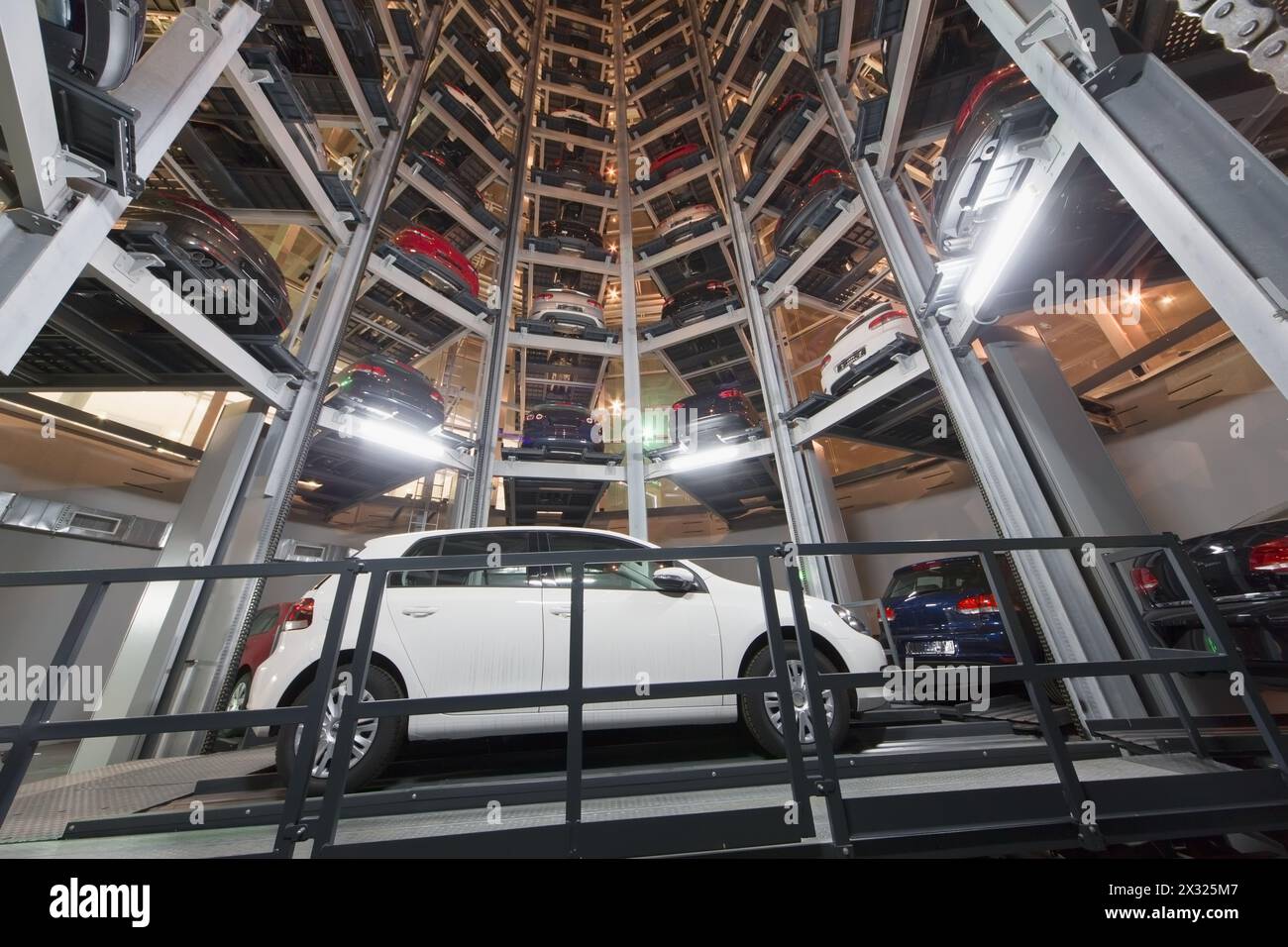 Bottom view of the car on parking lot with a multi-story automated car ...