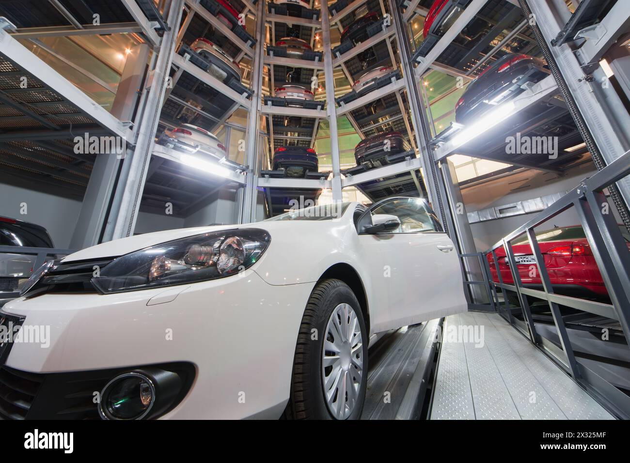 The car with open door against the background of the other cars in ...