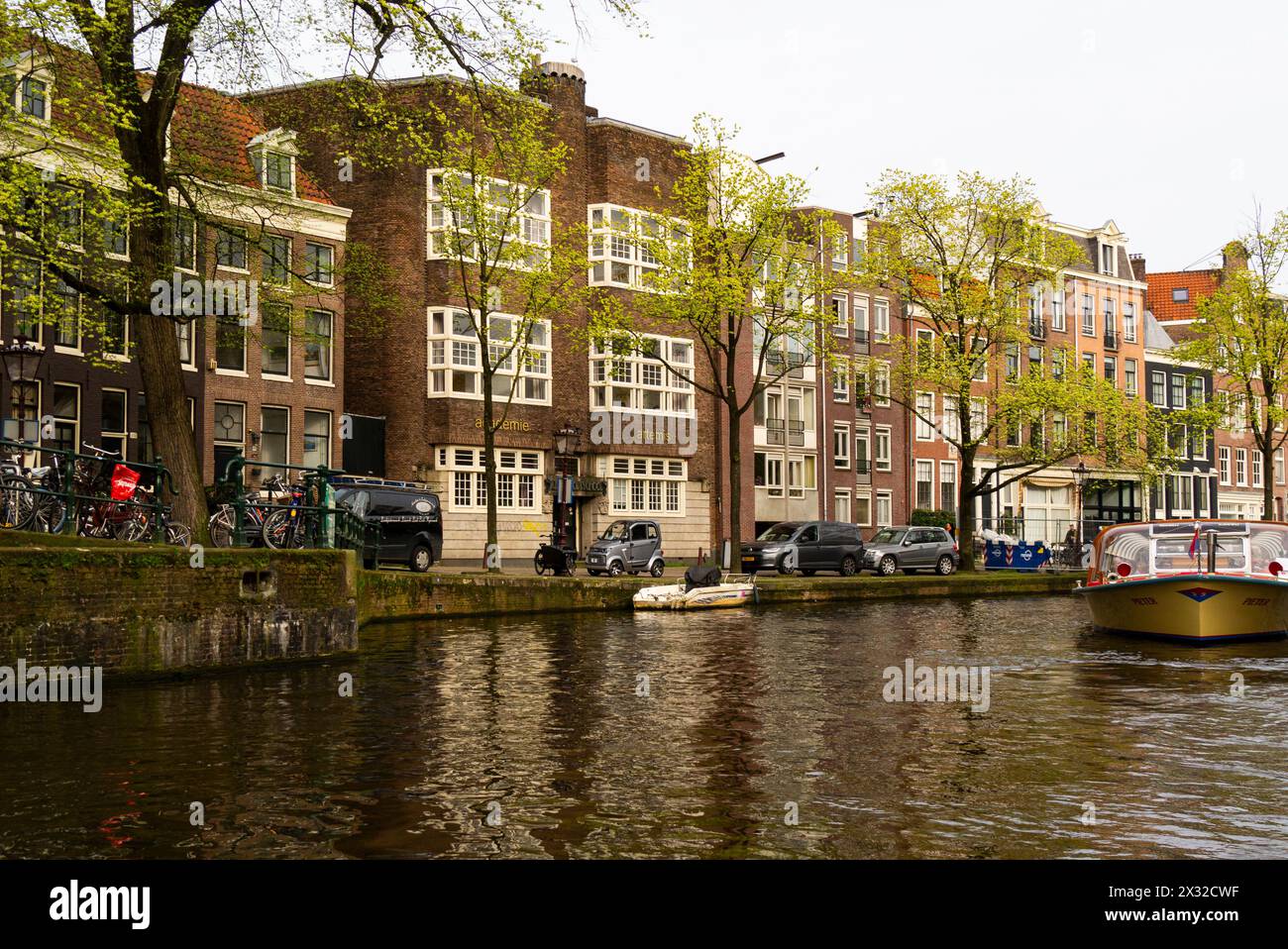 View of Amsterdam suburbs from a Dutch canal cruise boat with a ...