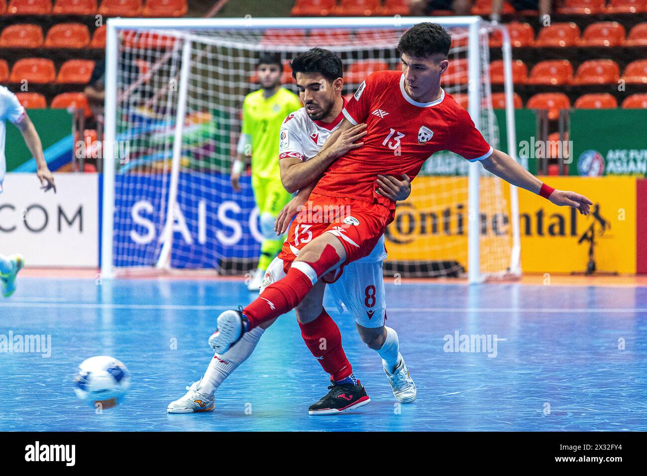 Muhamadjon Sharipov #8 of Tajikistan and Hussain Mohammadi #13 of ...