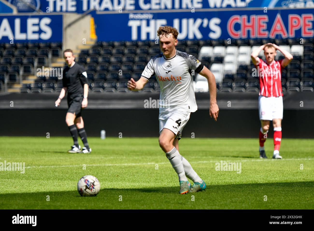 Swansea, Wales. 20 April 2024. Mitchell Bates of Swansea City in action ...