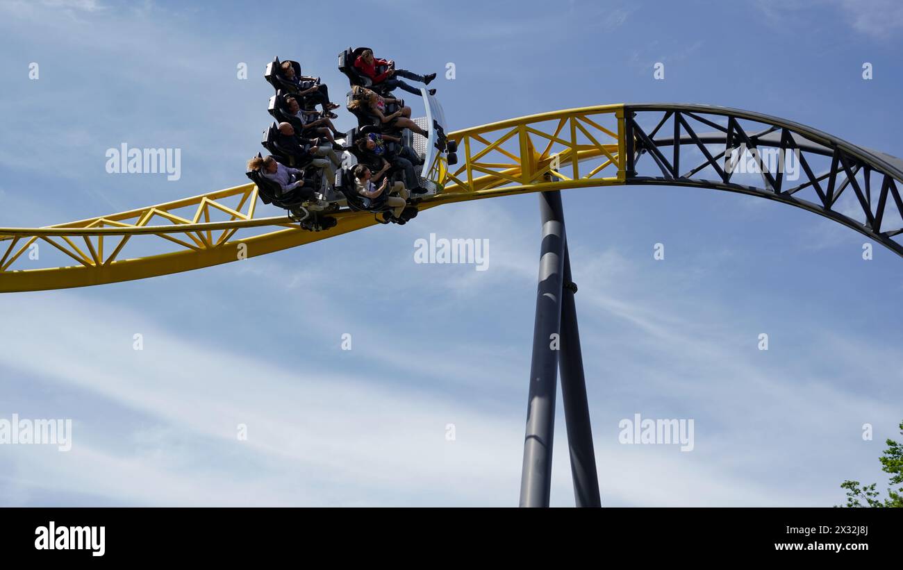 Young people have fun on the "Lost Gravity" rollercoaster at the ...