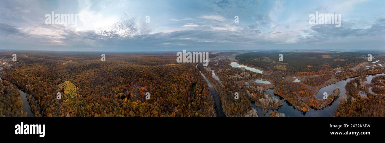 Aerial autumn Ukraine scenery panorama with river flowing in colorful ...