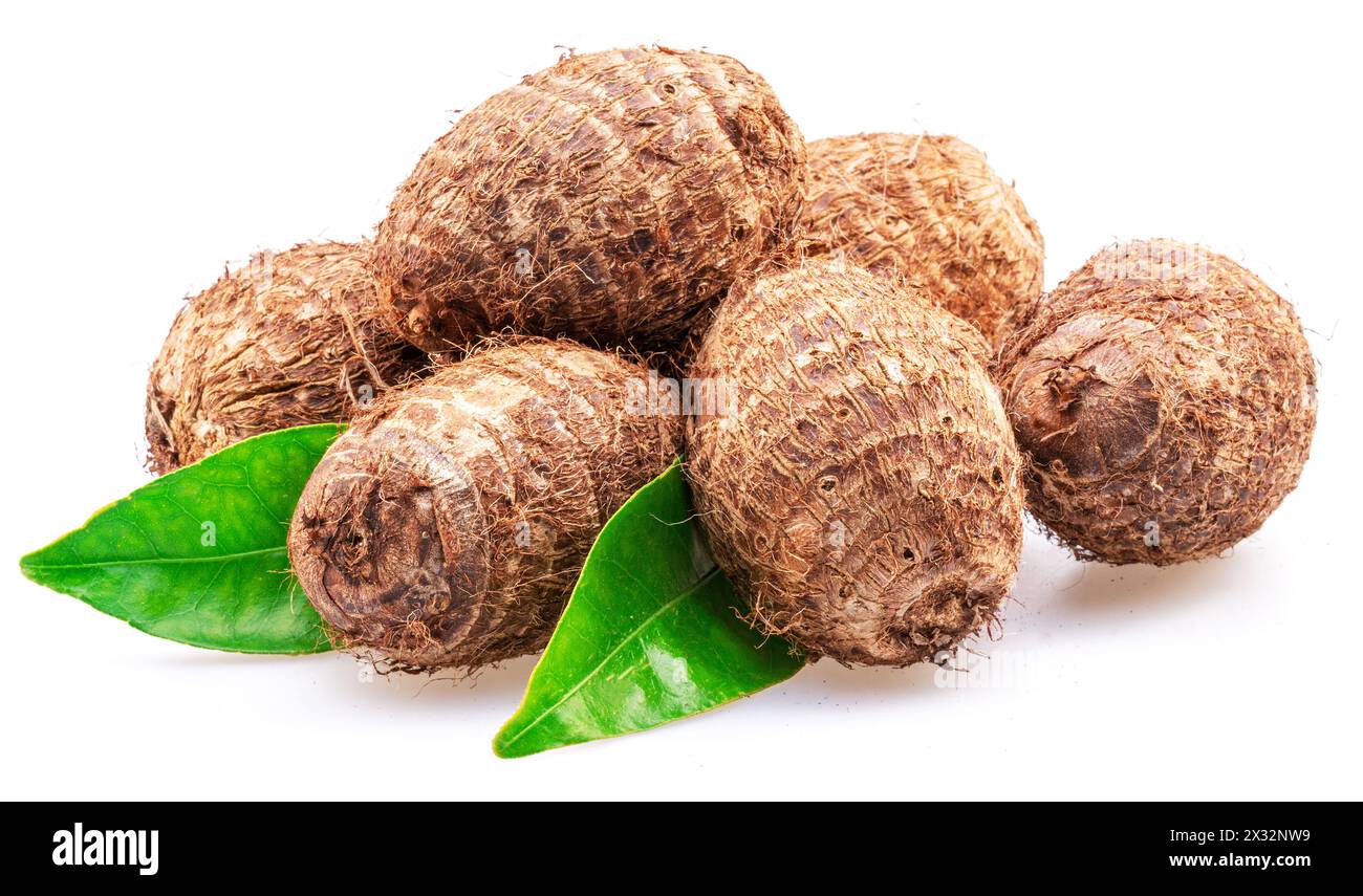 Raw organic eddoe or taro corms isolated on white background Stock ...