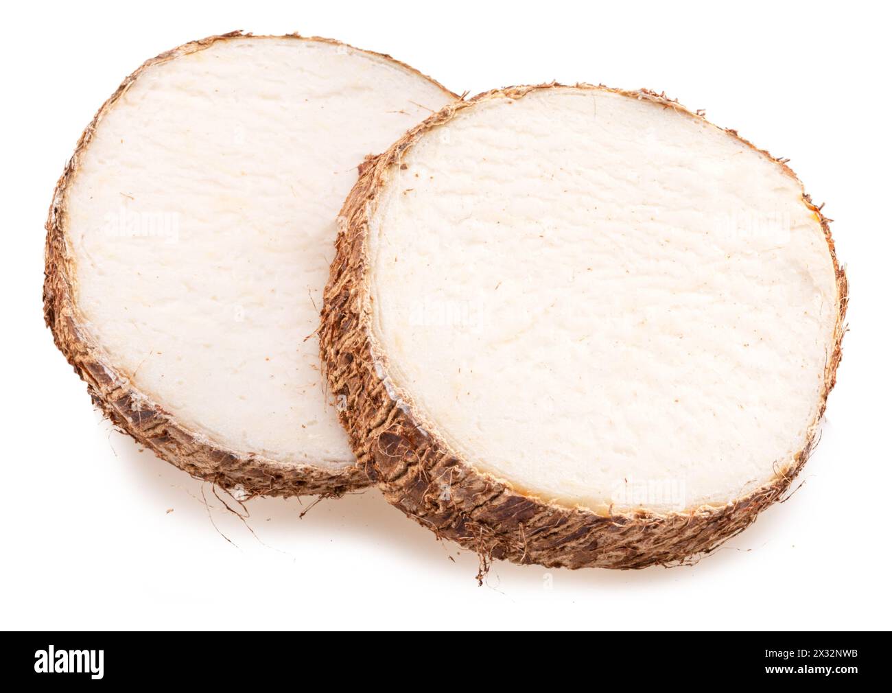 Raw organic eddoe or taro corms cross cuts isolated on white background ...