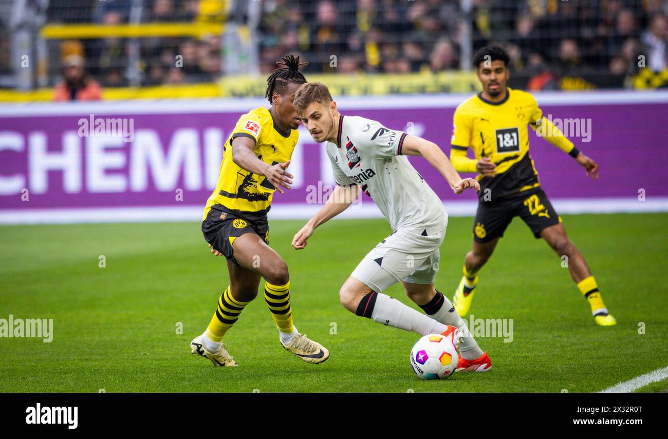 Dortmund, Germany. 21th Apr 2024. Josip Stanisic (Leverkusen) Jamie Bynoe-Gittens (BVB) Borussia ...