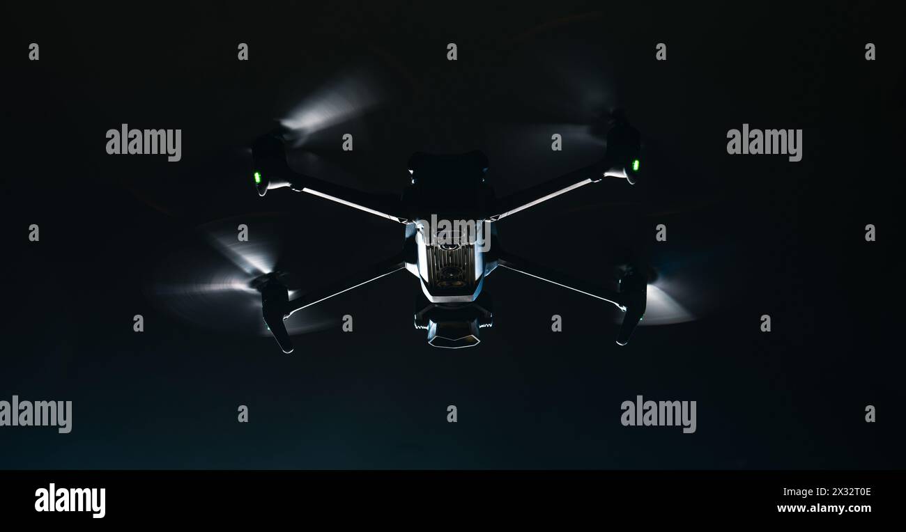 Modern Drone in Flight. Night Time Low Light Scenery. Aerial ...