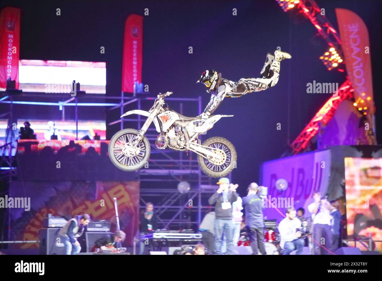 MOSCOW - MAR 02: Jump on a motorcycle with acrobatic elements on the ...