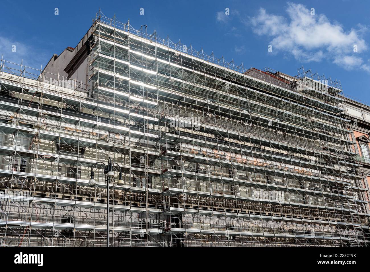 Scaffolding on an apartment block in Naples, Italy Stock Photo - Alamy